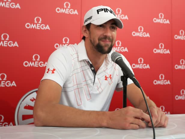 Michael Phelps is putting his golf career on hold to try swimming again ...