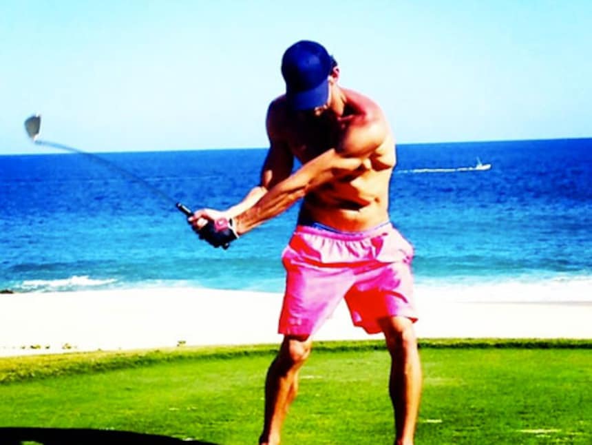 Michael Phelps shows what an incredibly fit man looks like swinging a ...