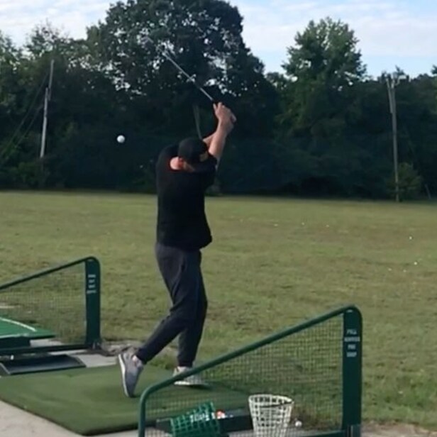 Stop what you're doing and watch this unbelievable backwards golf trick ...