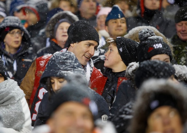Canadian Prime Minister Justin Trudeau watches Grey Cup from snowy ...