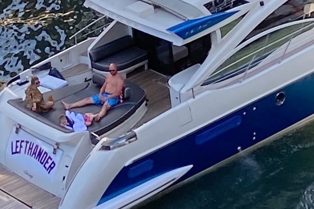 Jon Lester seen cruising the Chicago River in his boat “Lefthander ...