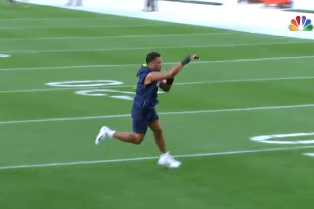 An injured Russell Wilson running imaginary two-minute drills by ...