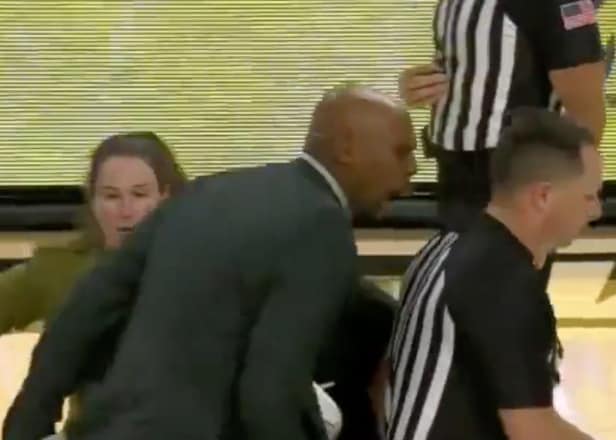 Jerry Stackhouse got so pissed at the refs that a cop had to hold him ...