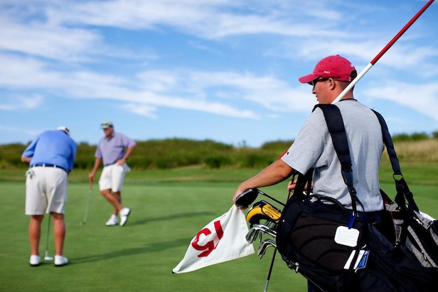These are the only things you need to know when taking a caddie | Golf ...